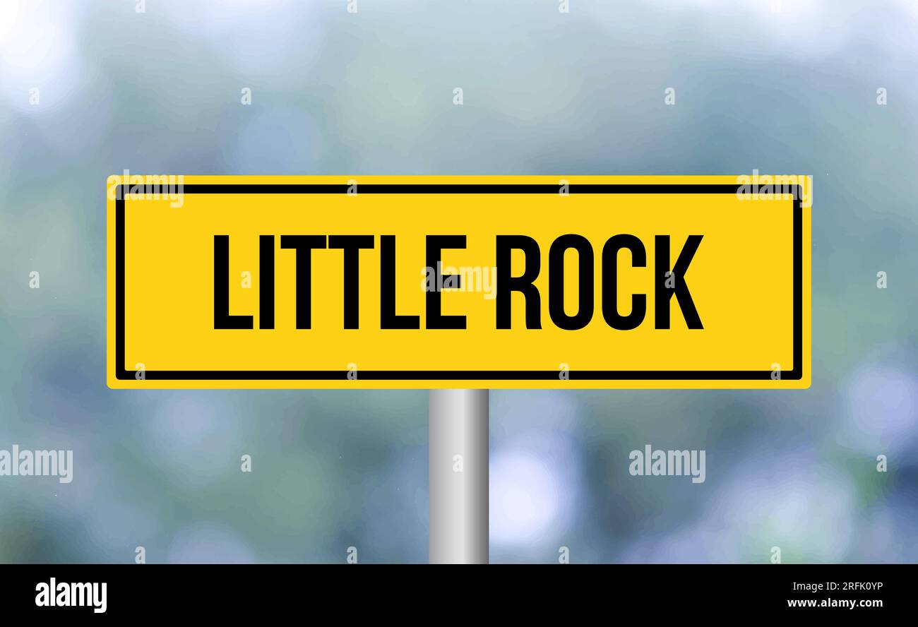 Little rock road sign on blur background Stock Photo - Alamy