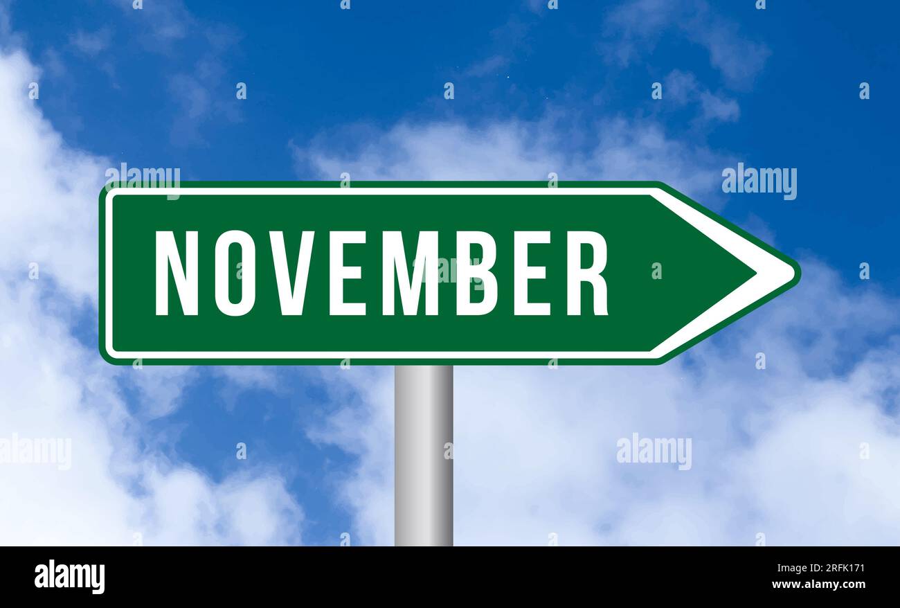 November road sign on cloudy sky background Stock Photo - Alamy