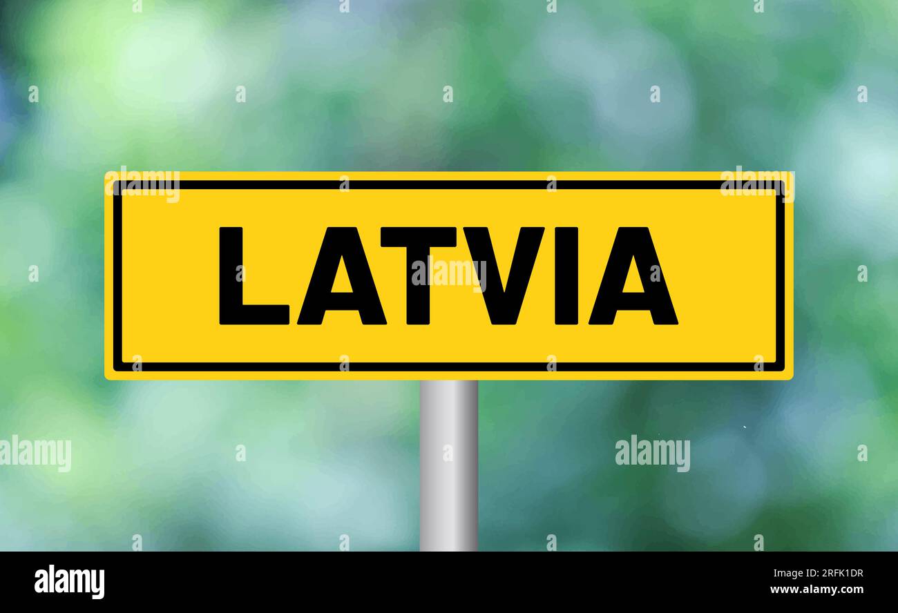 Latvia road sign on blur background Stock Photo - Alamy