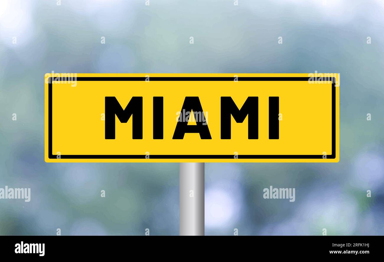 Miami road sign on blur background Stock Photo - Alamy