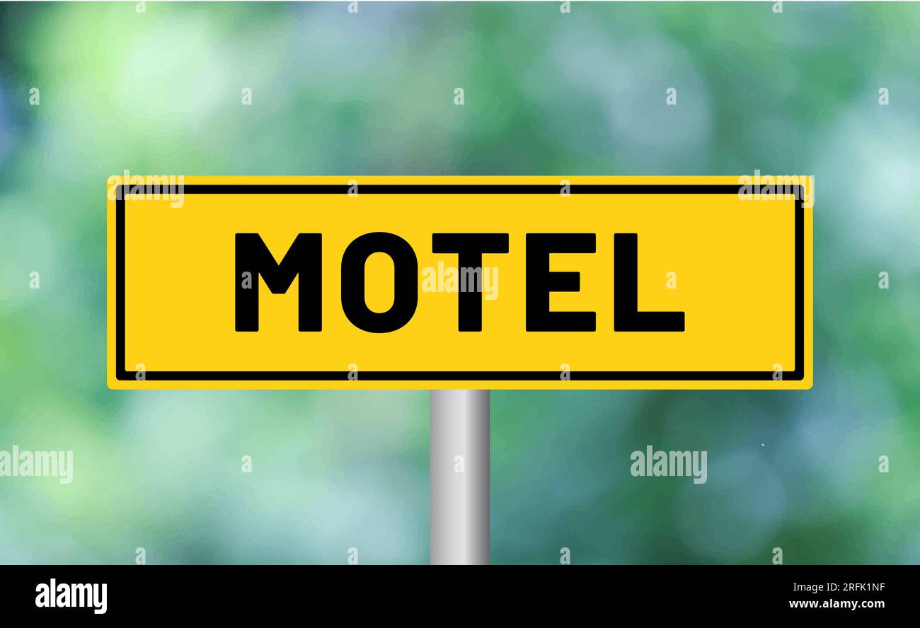 Motel road sign on blur background Stock Photo - Alamy