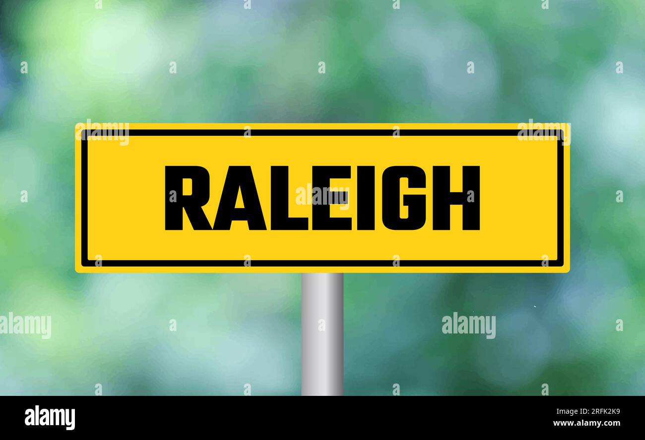 Raleigh road sign on blur background Stock Photo - Alamy