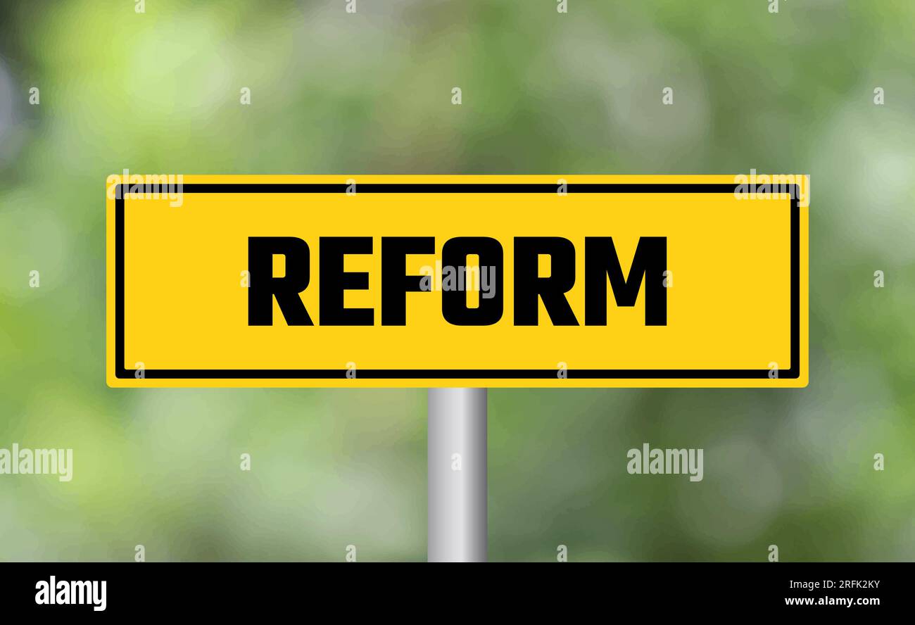Reform road sign on blur background Stock Photo - Alamy