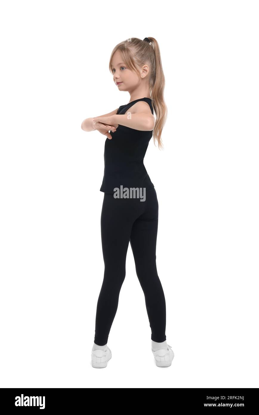 Little girl doing morning exercise on white background Stock Photo - Alamy