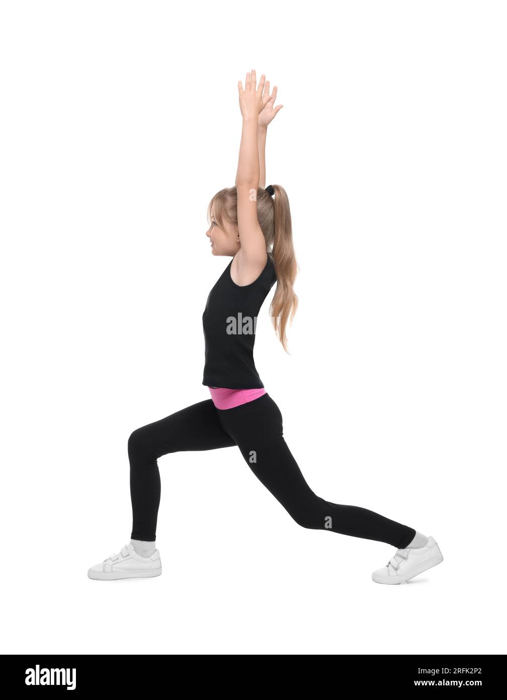 Little girl doing morning exercise on white background Stock Photo - Alamy