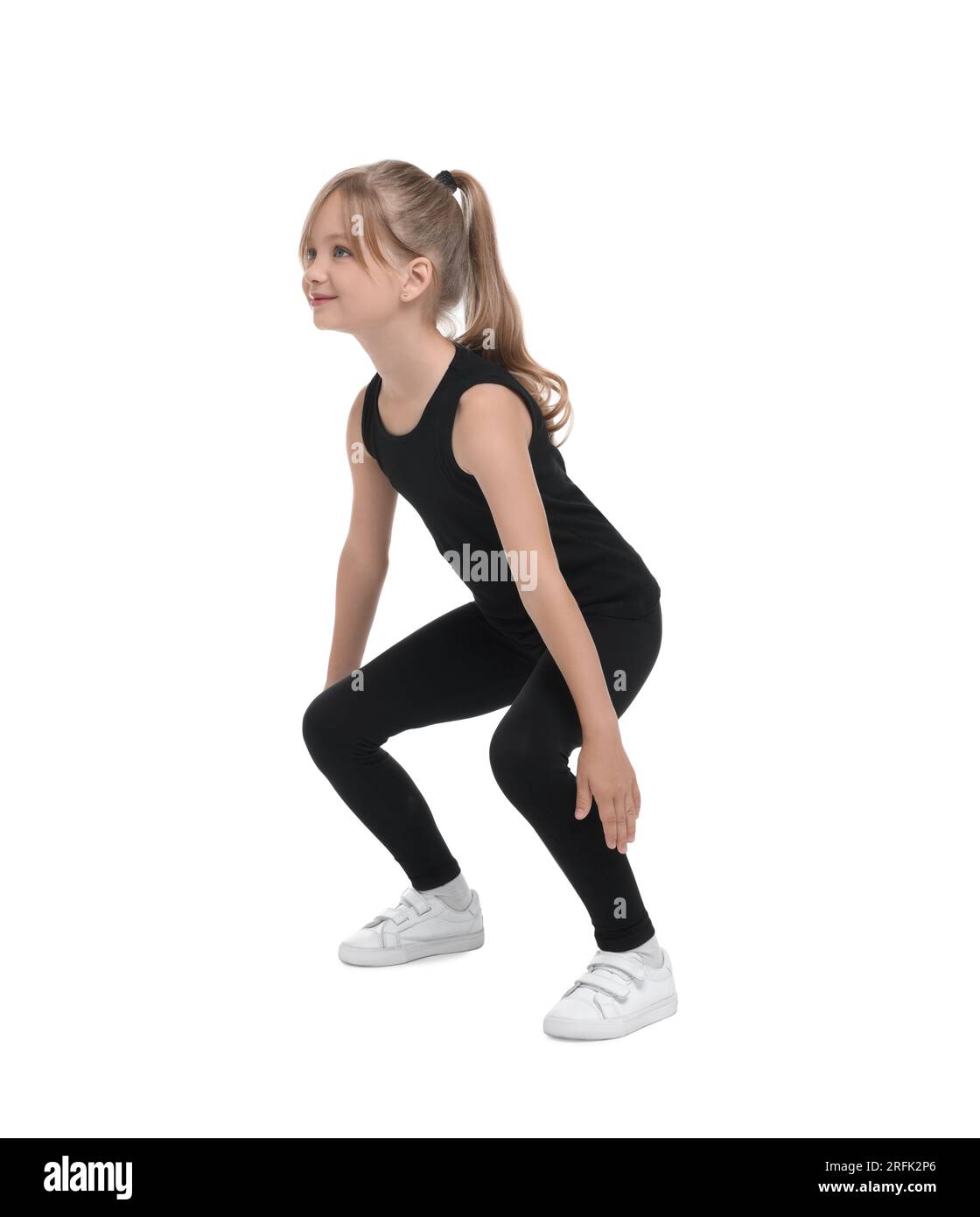 Little girl doing squats on white background. Morning exercise Stock ...
