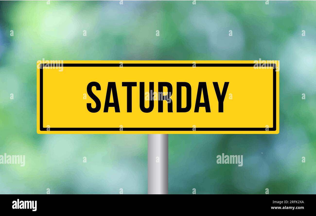 Saturday road sign on blur background Stock Photo - Alamy