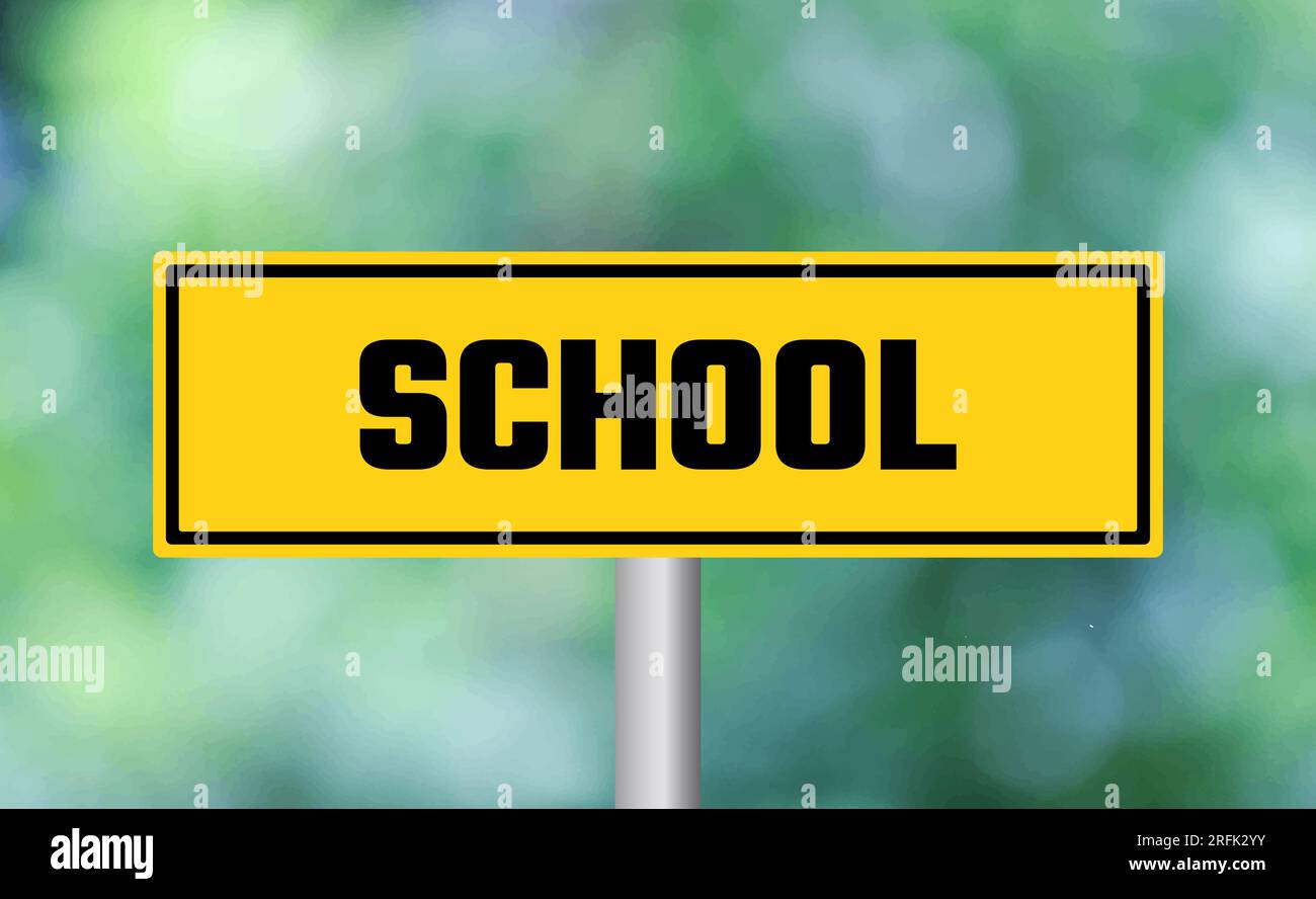 School road sign on blur background Stock Photo - Alamy
