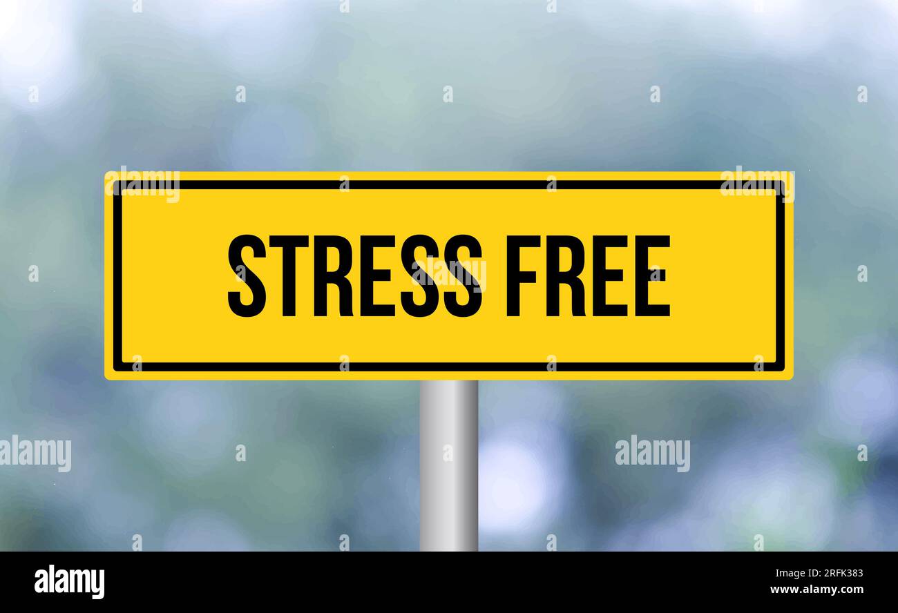 Stress free road sign on blur background Stock Photo - Alamy