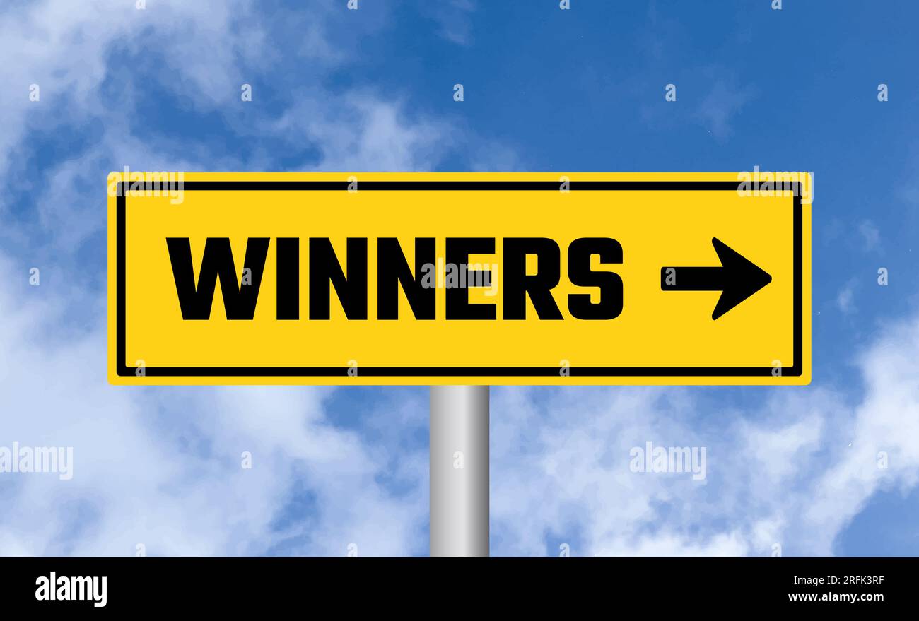 Winners road sign on blue sky background Stock Photo - Alamy