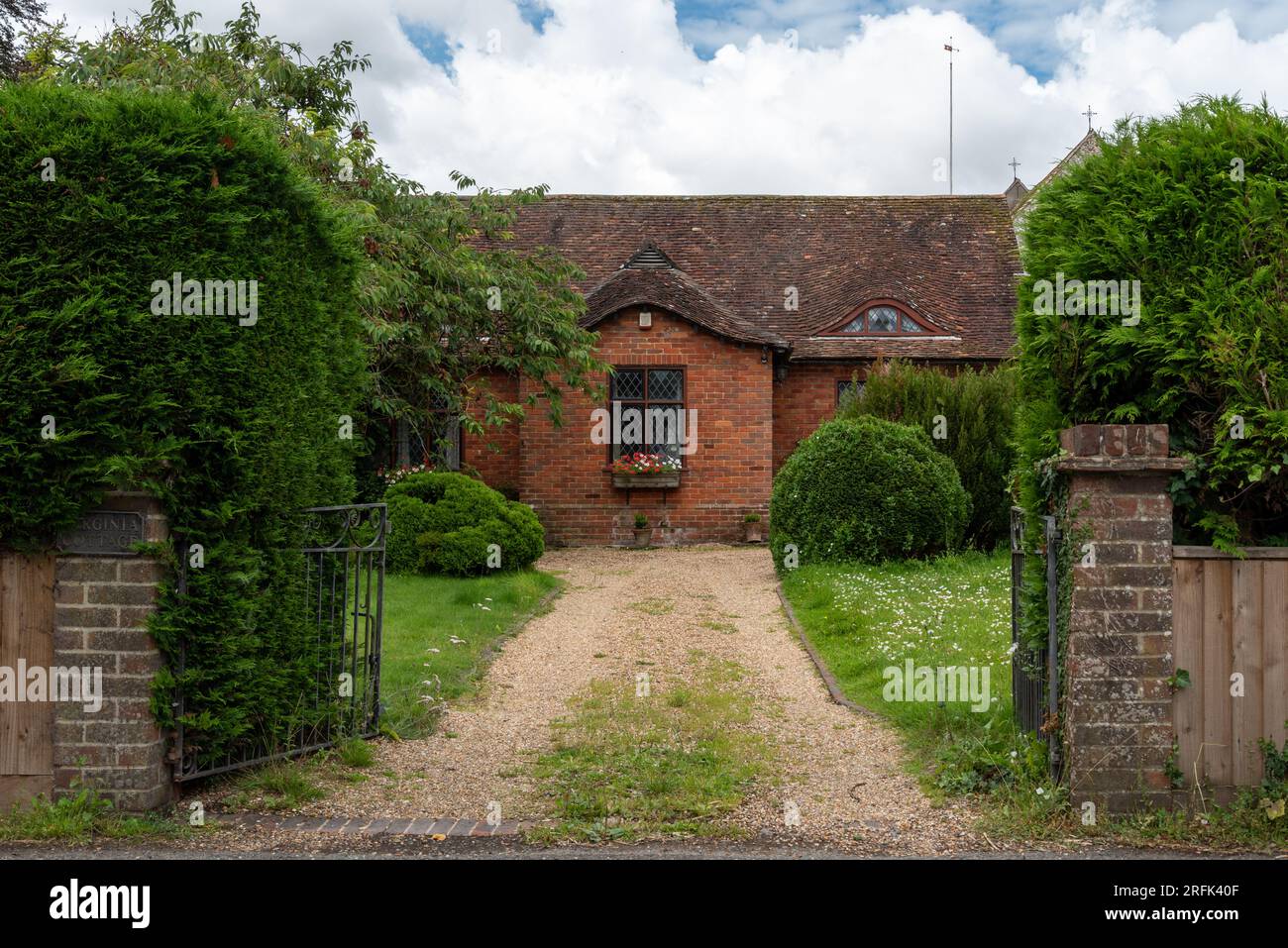 Residential home with driveway leading to the entrance in the village ...