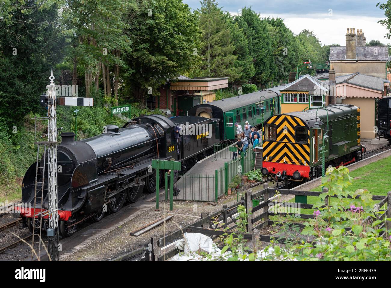 Steam train prepares to depart from Alresford station, taking ...