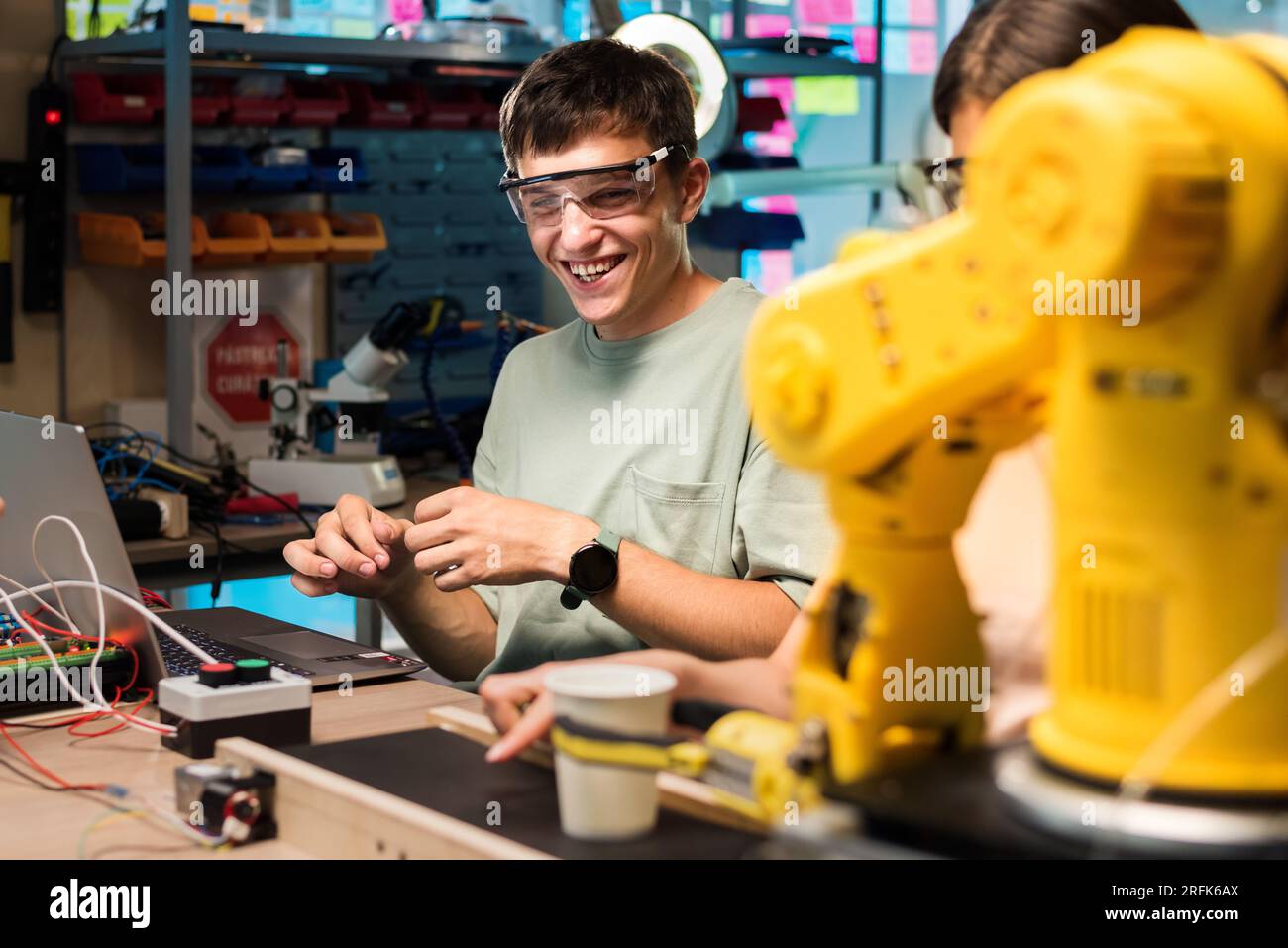Group young people doing experiments hi-res stock photography and ...