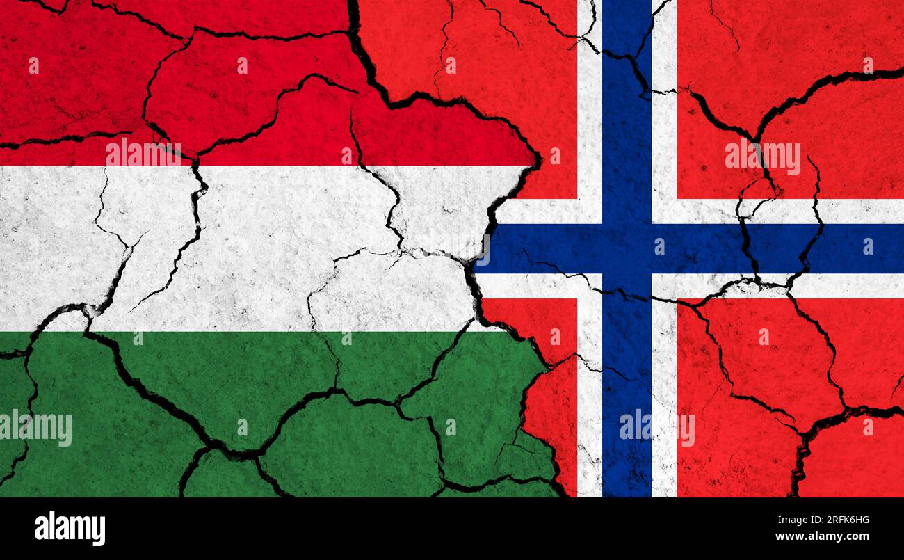 Flags of Hungary and Norway on cracked surface - politics, relationship ...