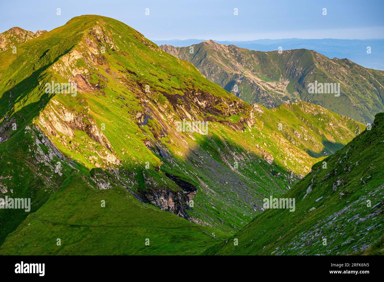 The Fagaras Mountains at sunrise. A view on the Mount Paltinul from the ...