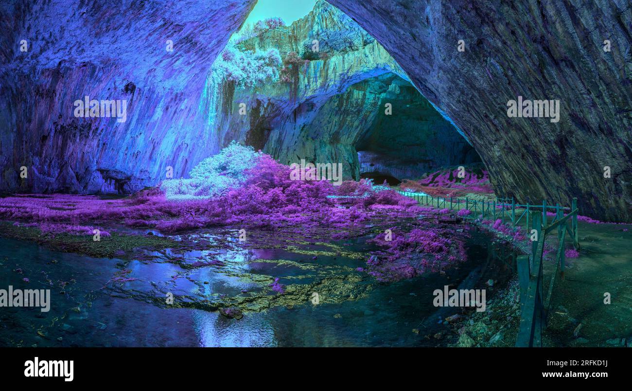 Mystical cave in bright fantastic colors Stock Photo - Alamy