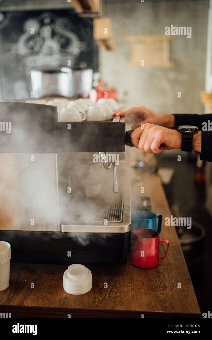 Barista making coffee espresso machine hi-res stock photography and ...