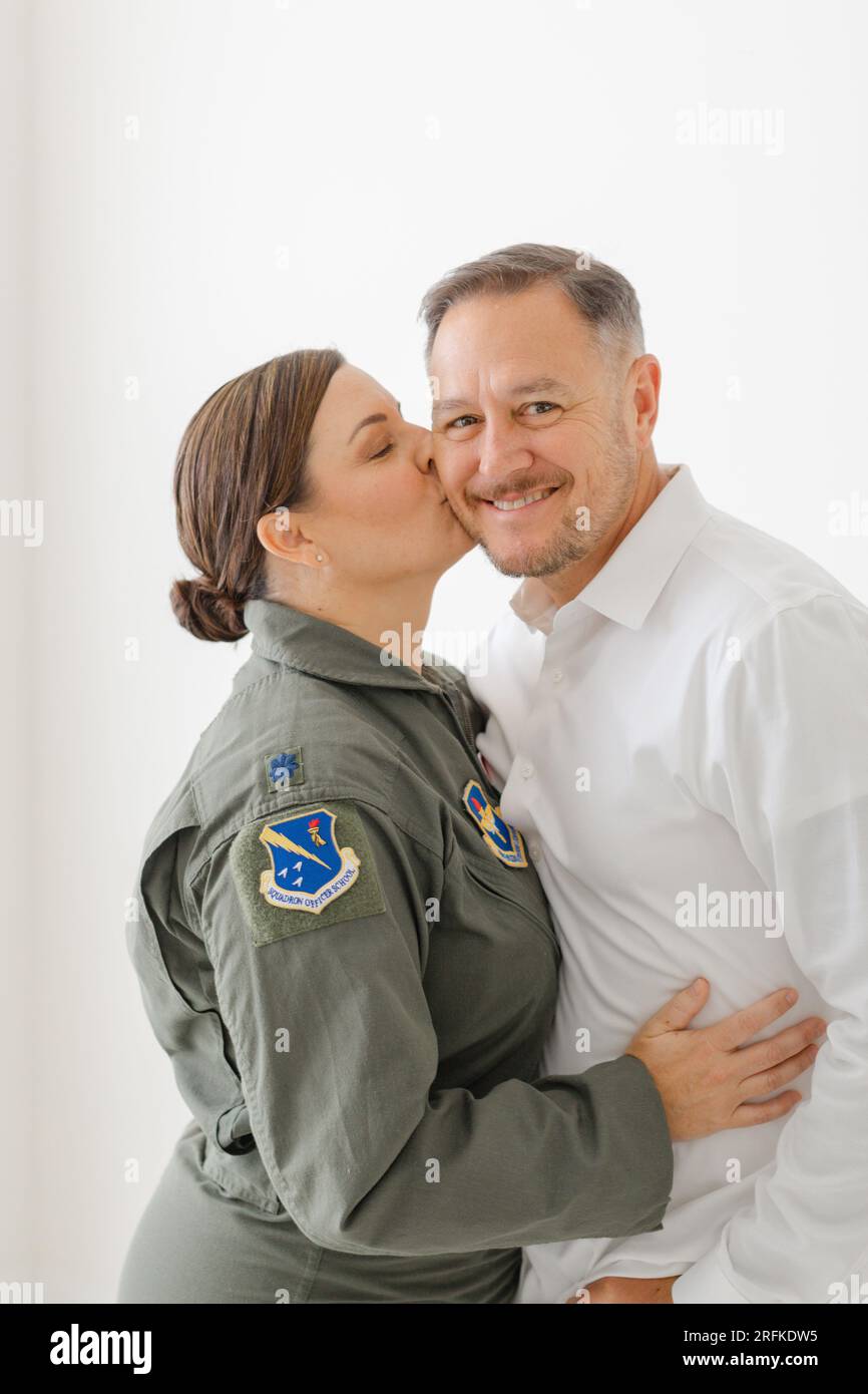 husband and active duty military wife in flight suit Stock Photo - Alamy