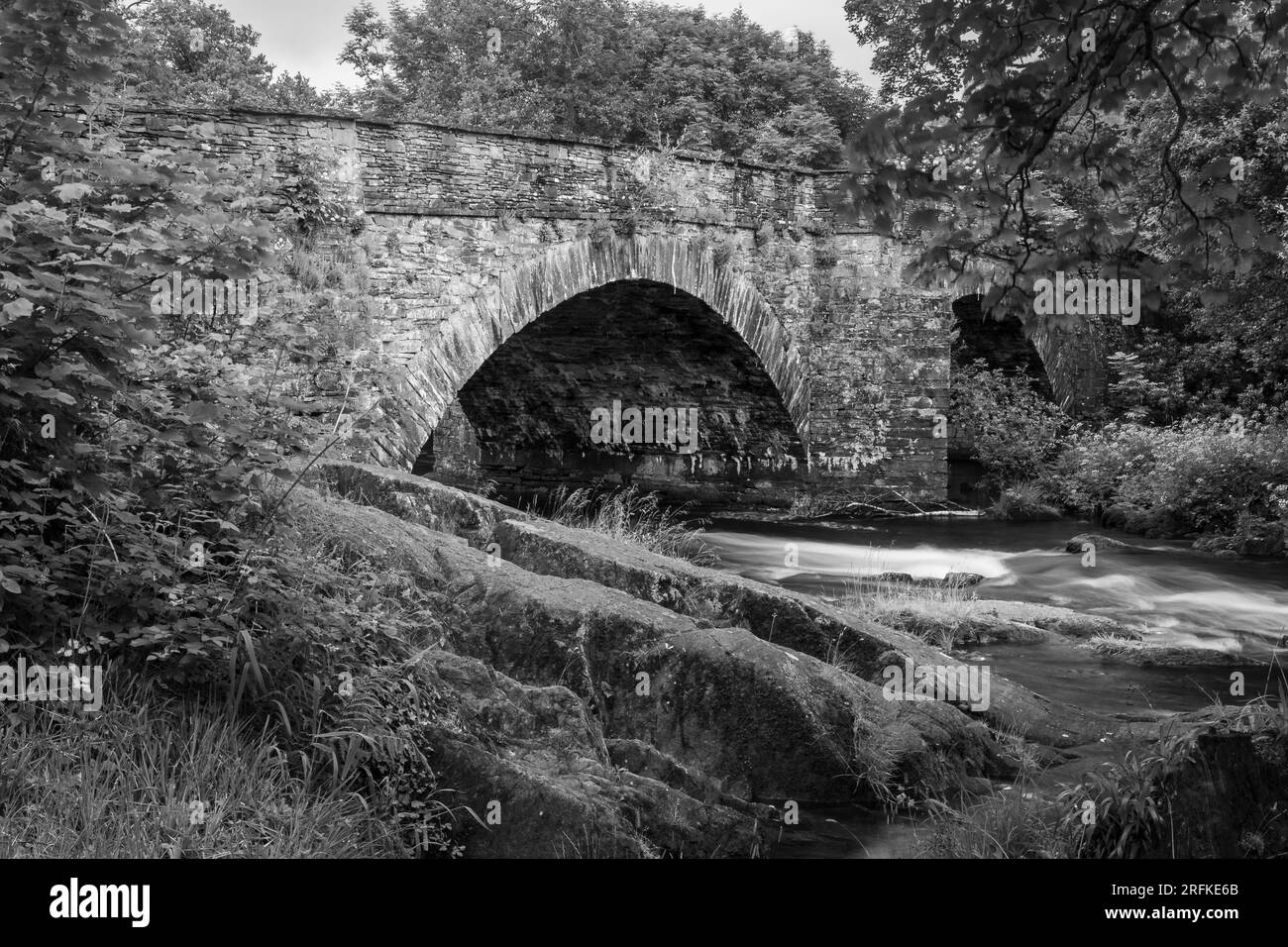 The River Brathay flowing under Skelwith Bridge Stock Photo - Alamy
