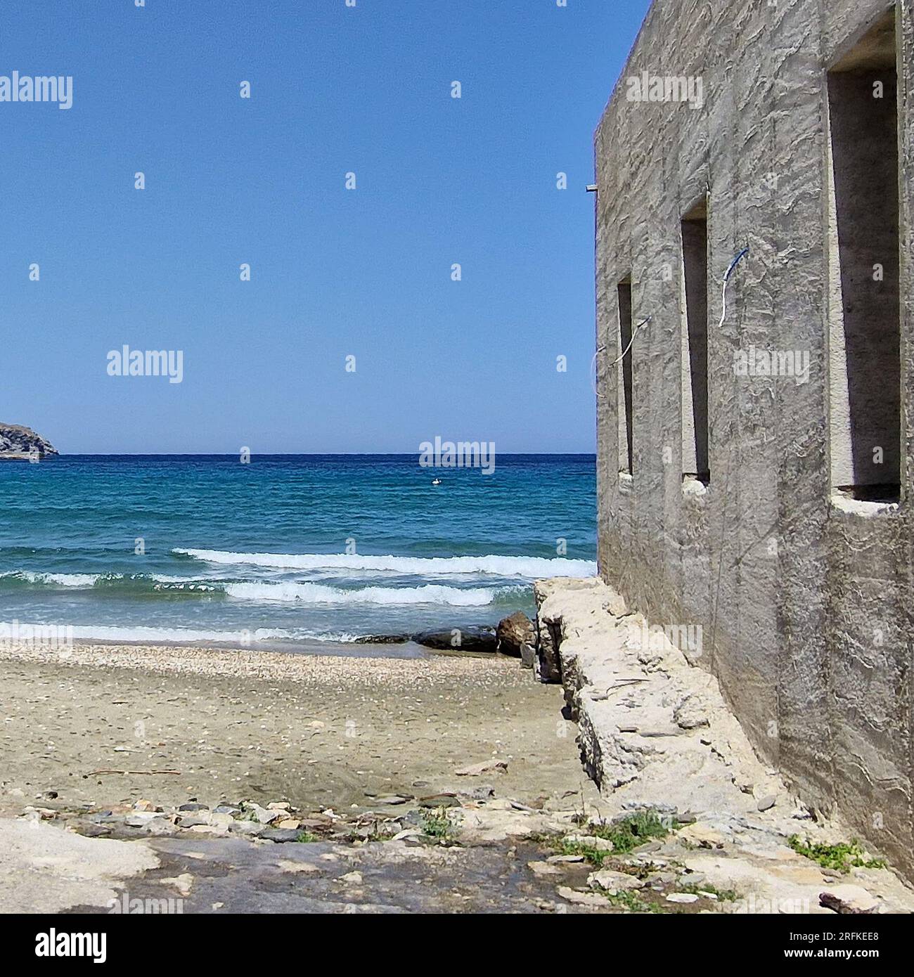 Concrete building on the seaside, Chora, Andros island, Greece ...