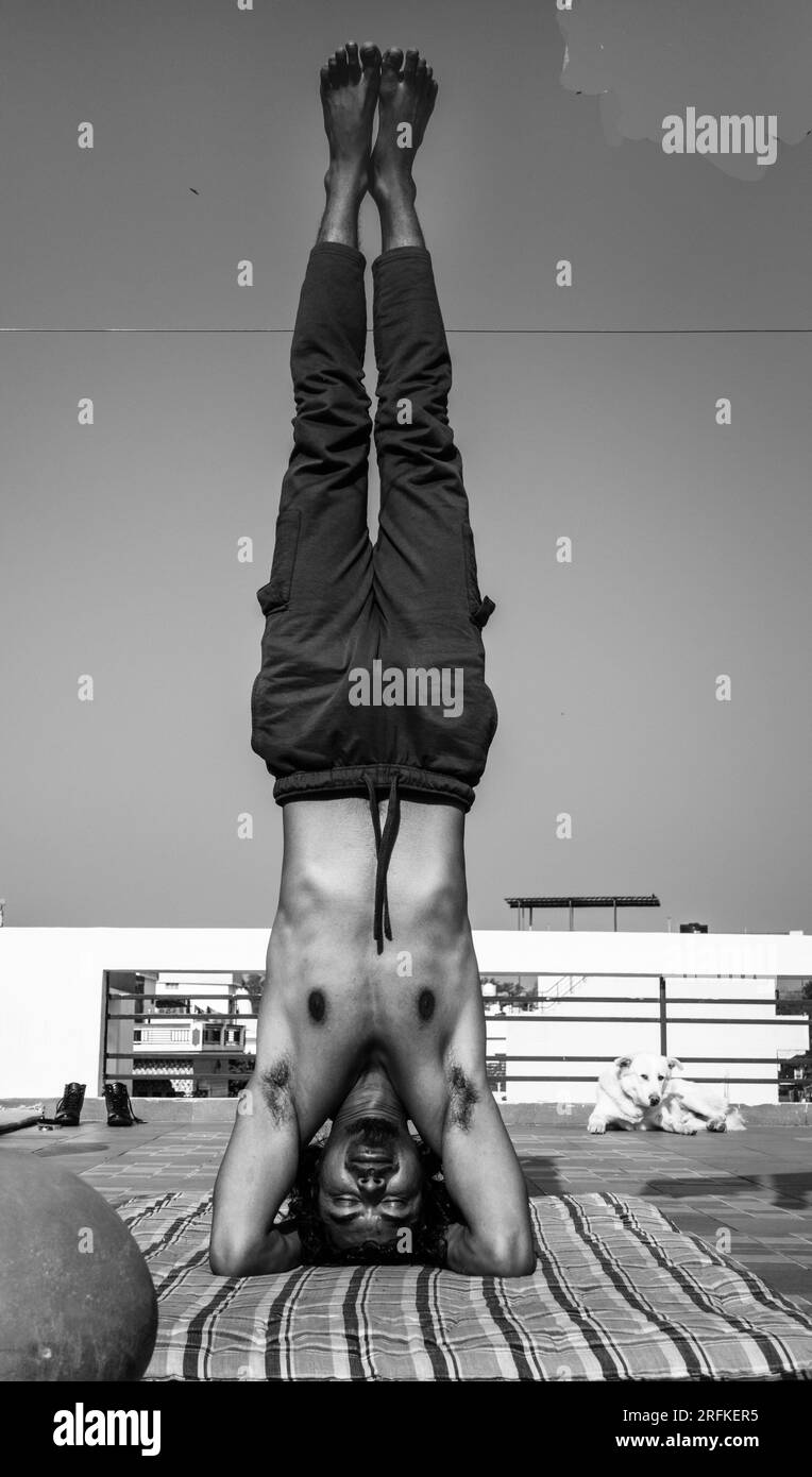 Oct.14th 2022 Uttarakhand, India. Yogic Indian man gracefully balances ...