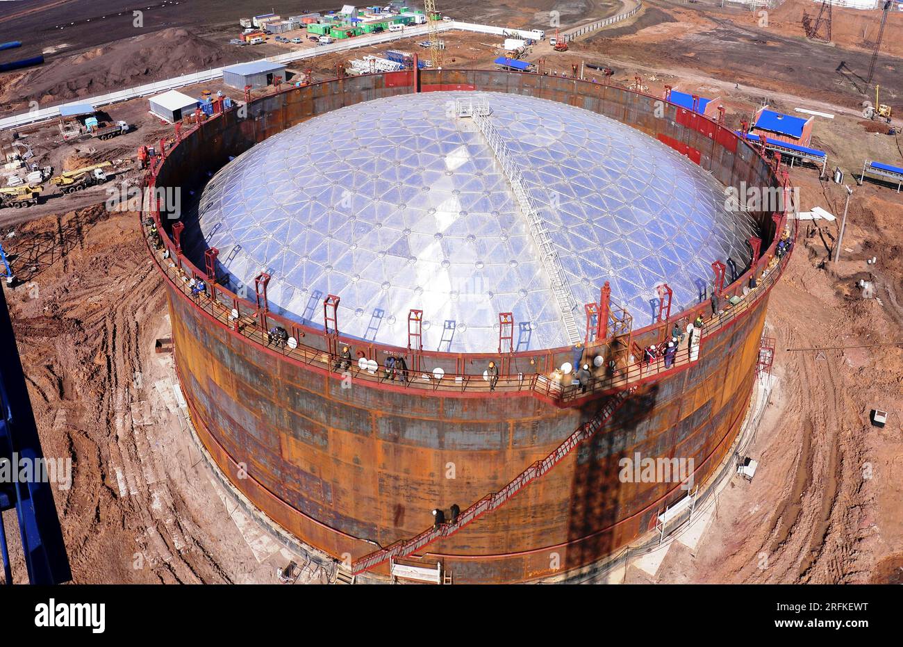 Domed metal roof of the oil tank Stock Photo - Alamy