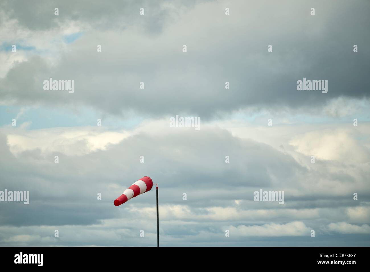 Windsock against cloudy sky hi-res stock photography and images - Alamy