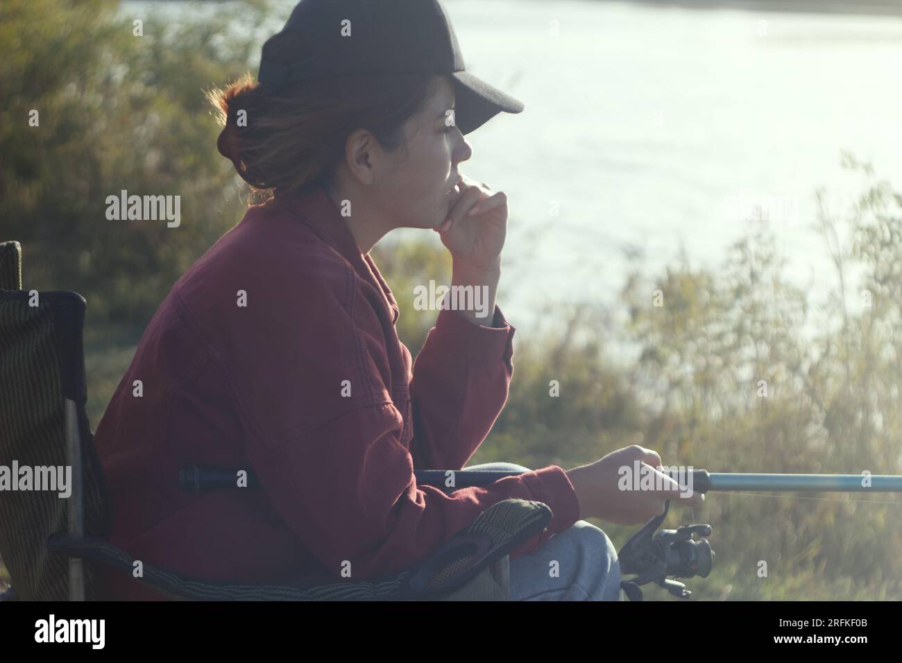 Young asian woman holding fishing hi-res stock photography and images ...