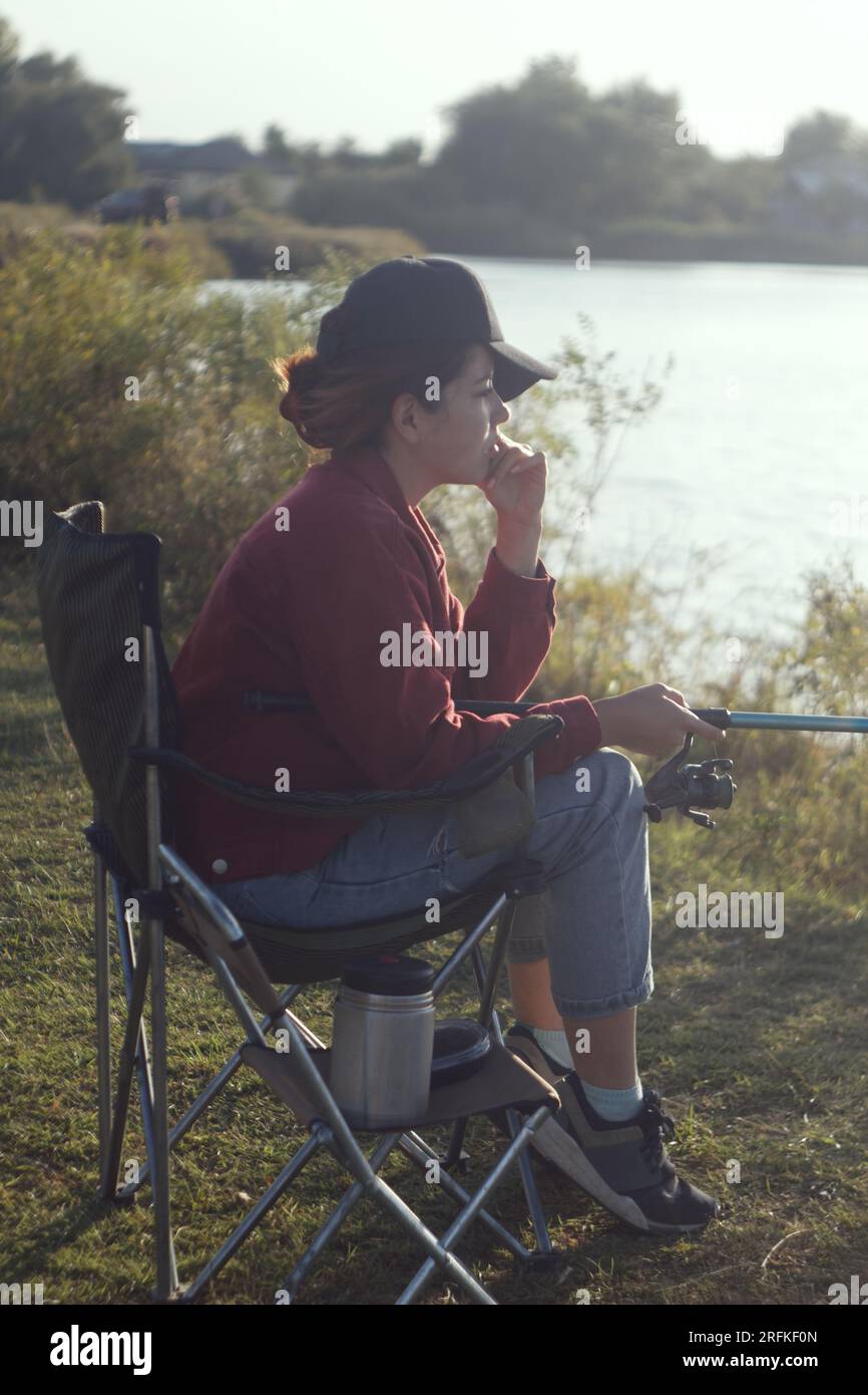 Asian woman fishing hi-res stock photography and images - Alamy