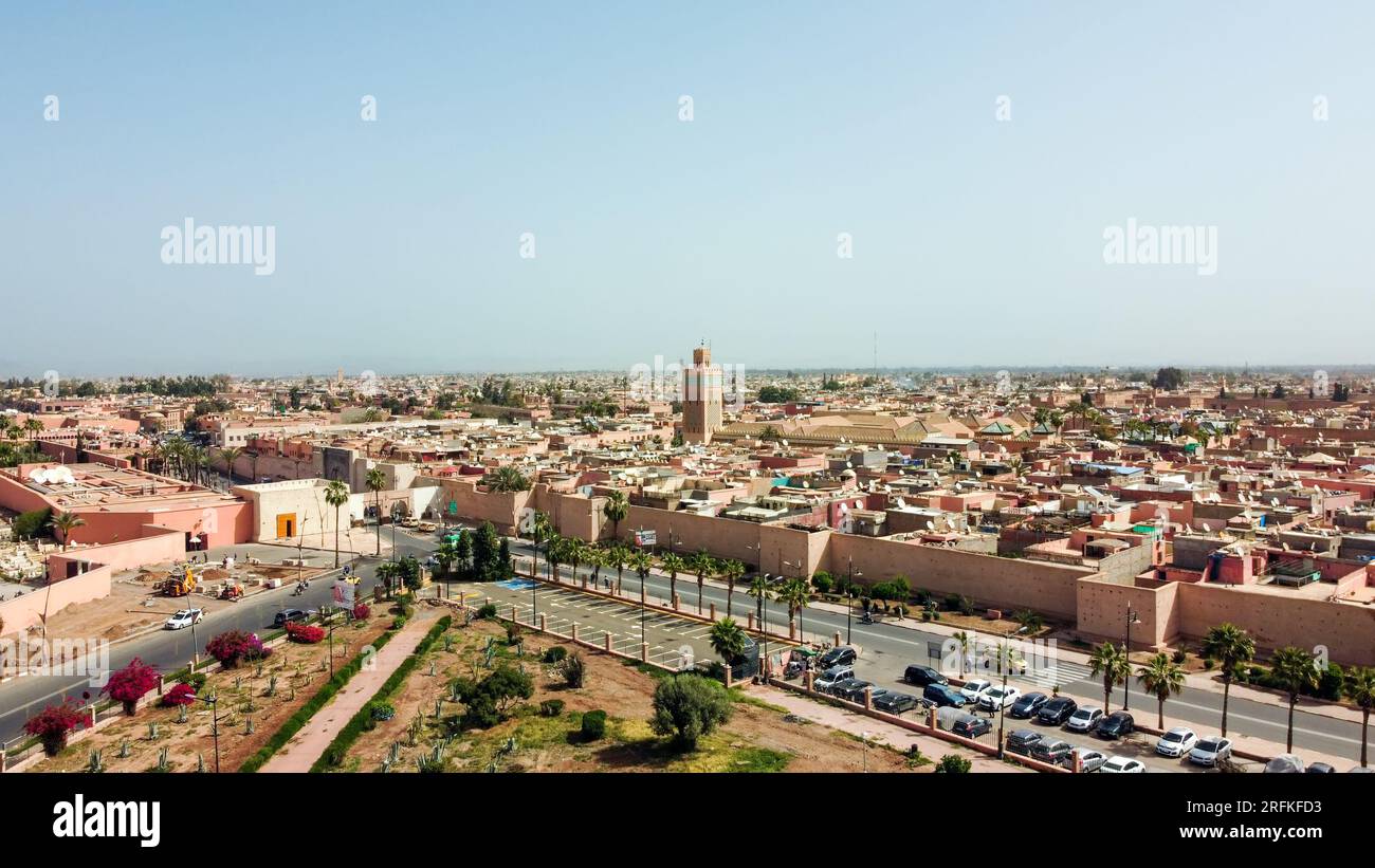 Aerial drone view of Marrakesh, Morocco. View of city downtown with Ben ...