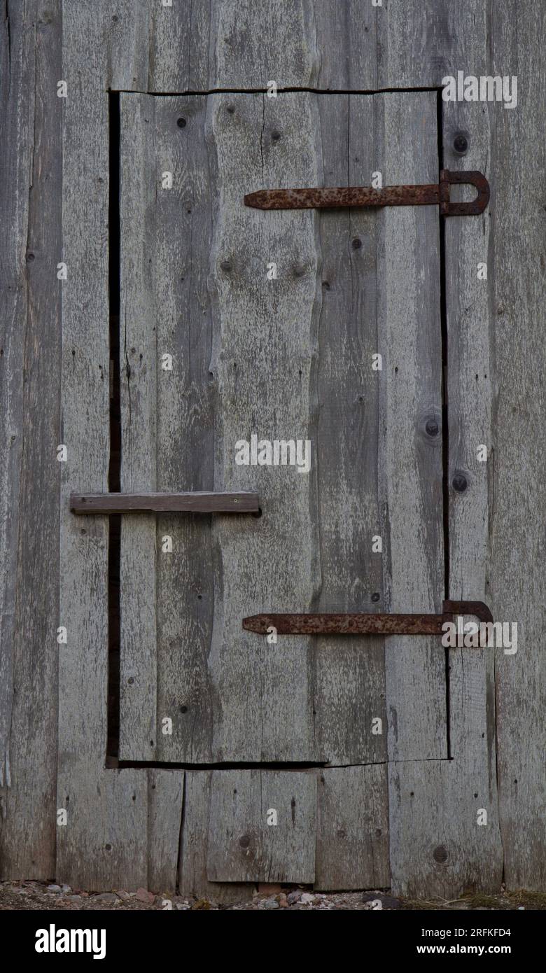 Old rusty hinge on a wooden door. Old rustic background Stock Photo - Alamy