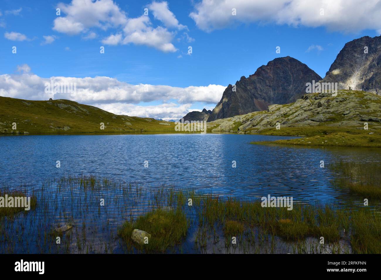 Lake in Gradental valley with the peak of Georgskopf mountain in ...