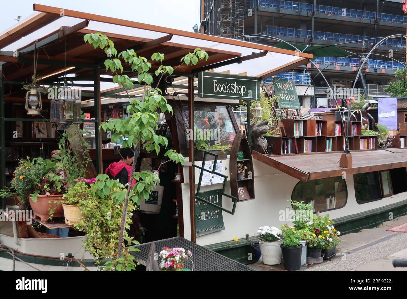 Plants at the entrance & displays of books on the roof entice you ...