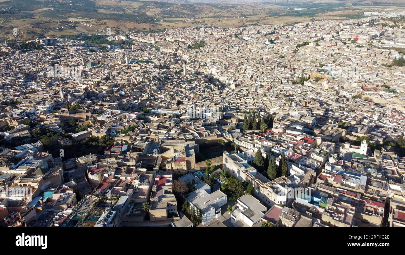 Aerial drone view of Fes at sunset, Morocco. Multiple residential ...
