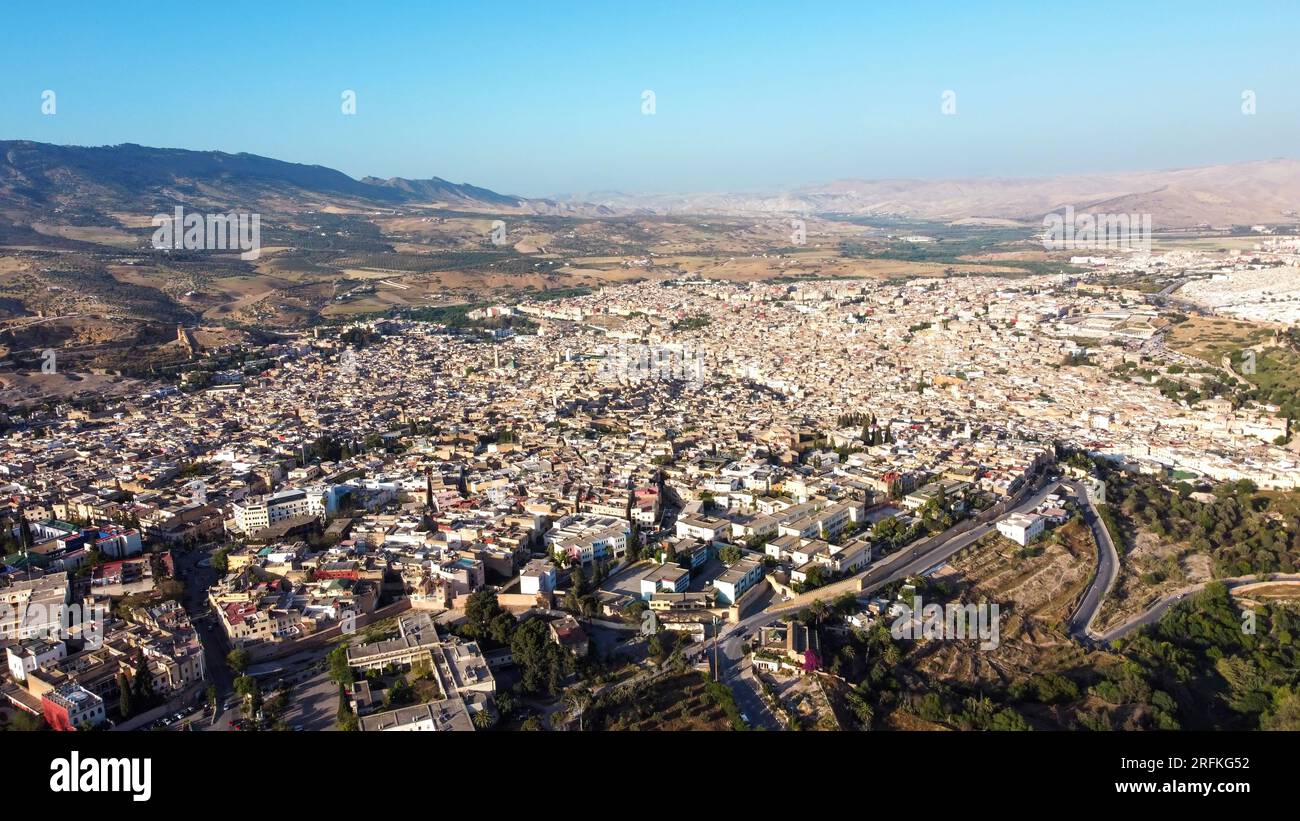 Aerial drone view of Fes at sunset, Morocco. Multiple residential ...