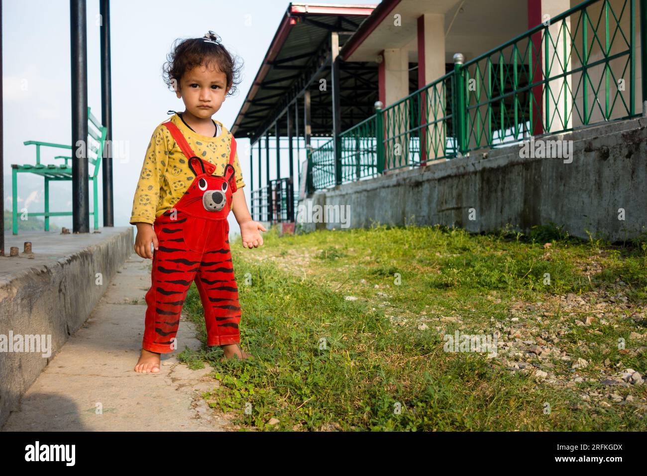 Oct.14th 2022 Uttarakhand, India.Young Indian child joyfully exploring ...