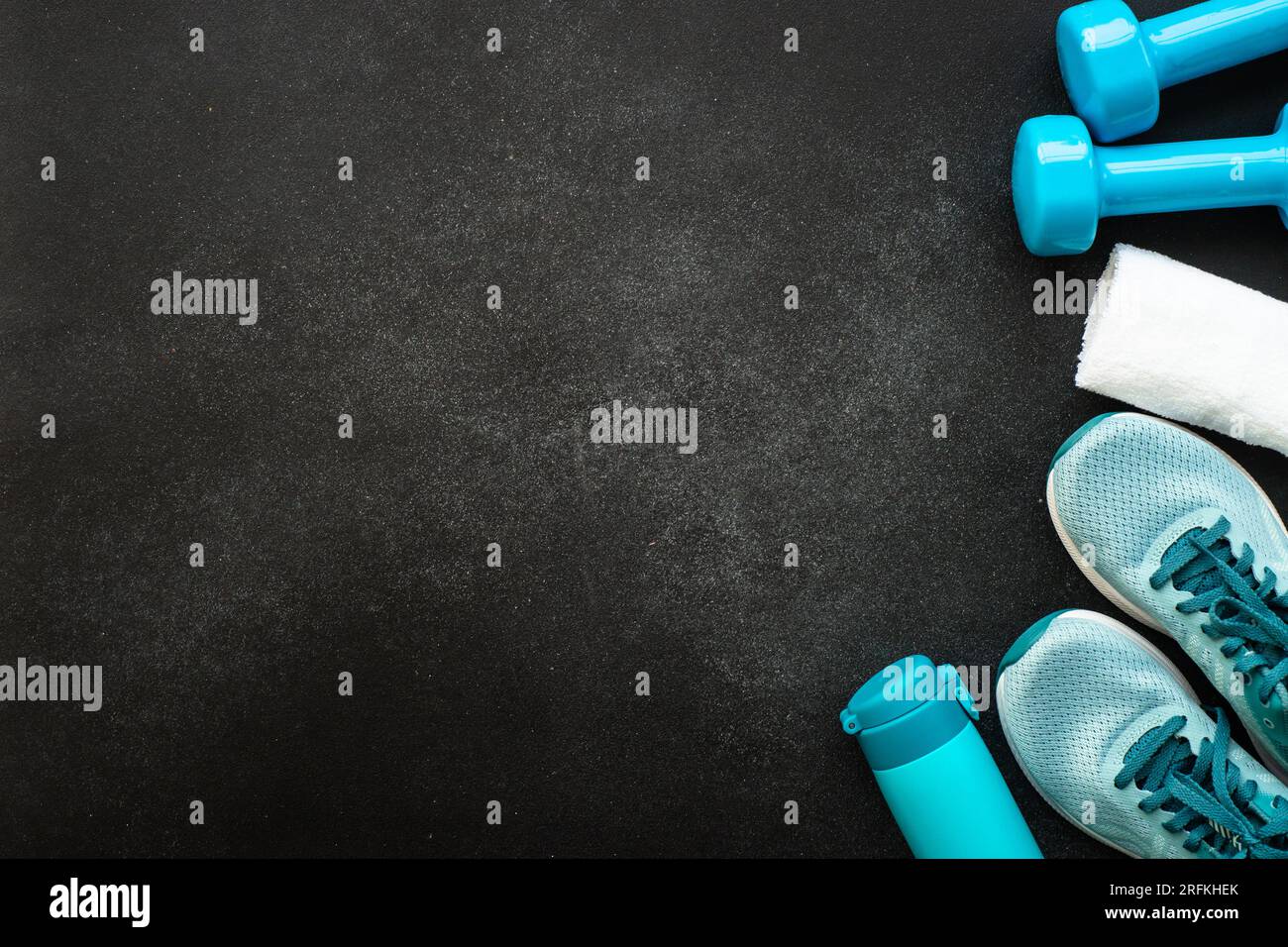 Fitness equipment at black background top view Stock Photo - Alamy