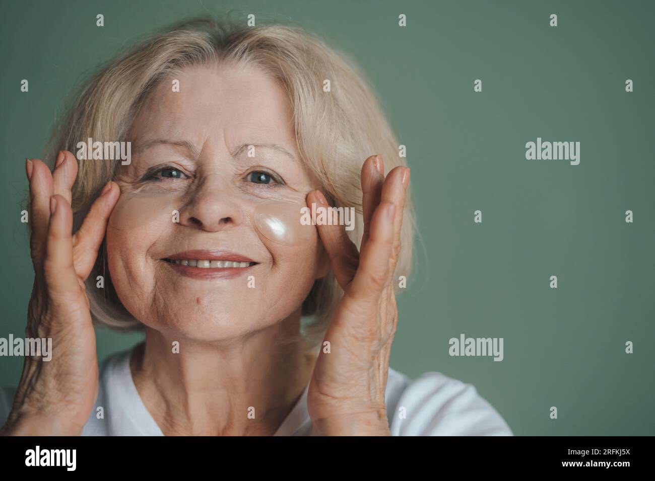 Senior woman eye patches doing hi-res stock photography and images - Alamy