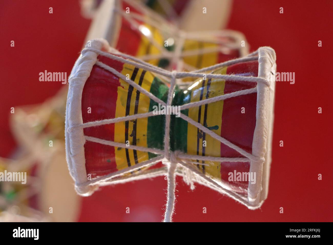 Damru, with the idol of Lord Shiva Parvati With different focus, Damru ...