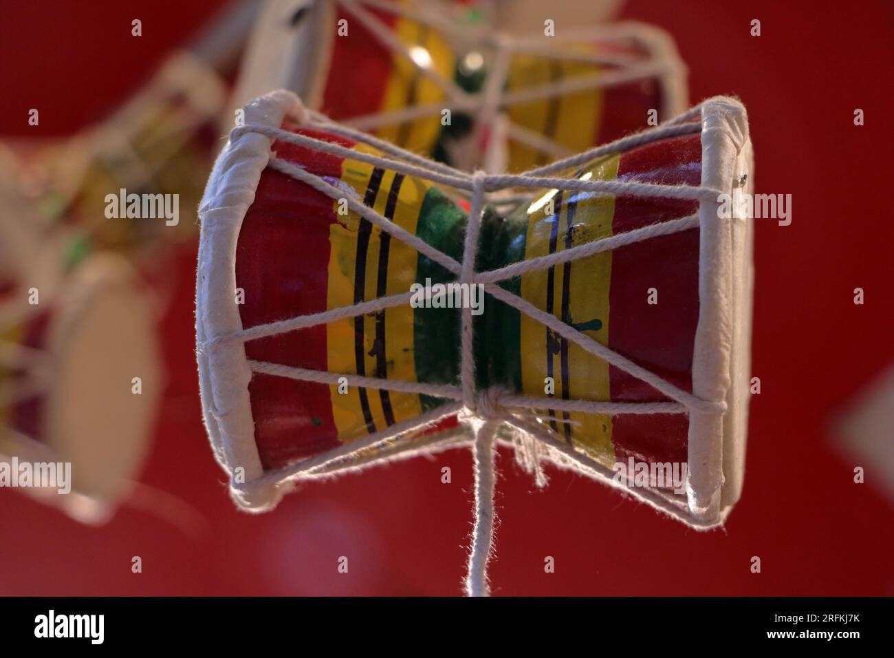 Damru, with the idol of Lord Shiva Parvati With different focus, Damru ...