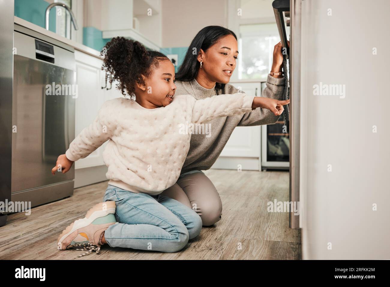 Oven, teaching and parent cooking with child in kitchen for development ...