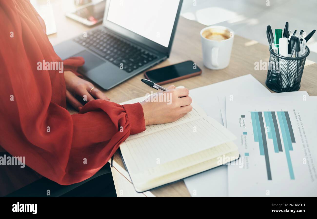 Hand, notebook and person writing, analytics paperwork on office desk ...