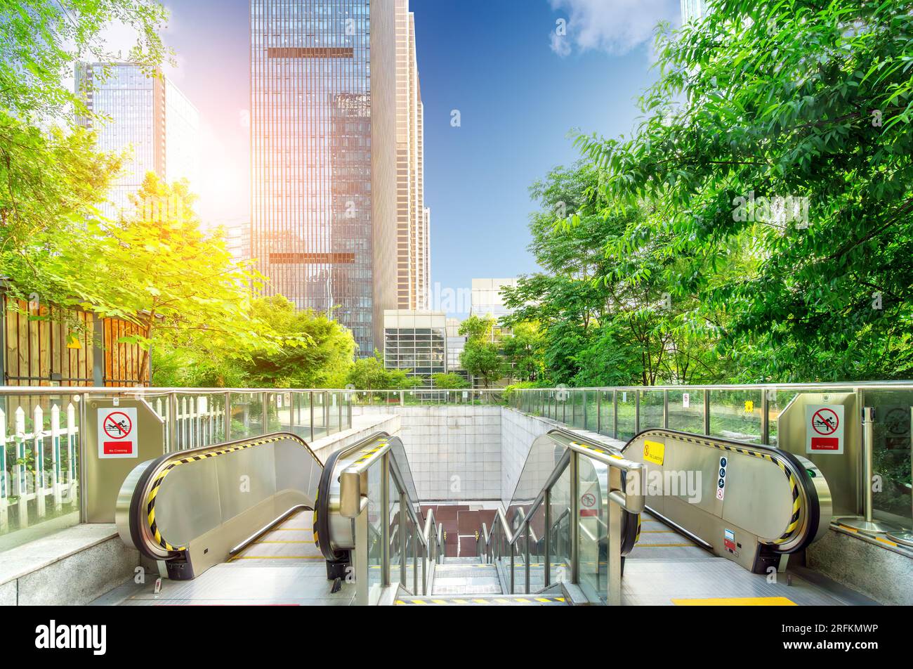 Skyscrapers and escalators in the financial district of Qianjiang New ...