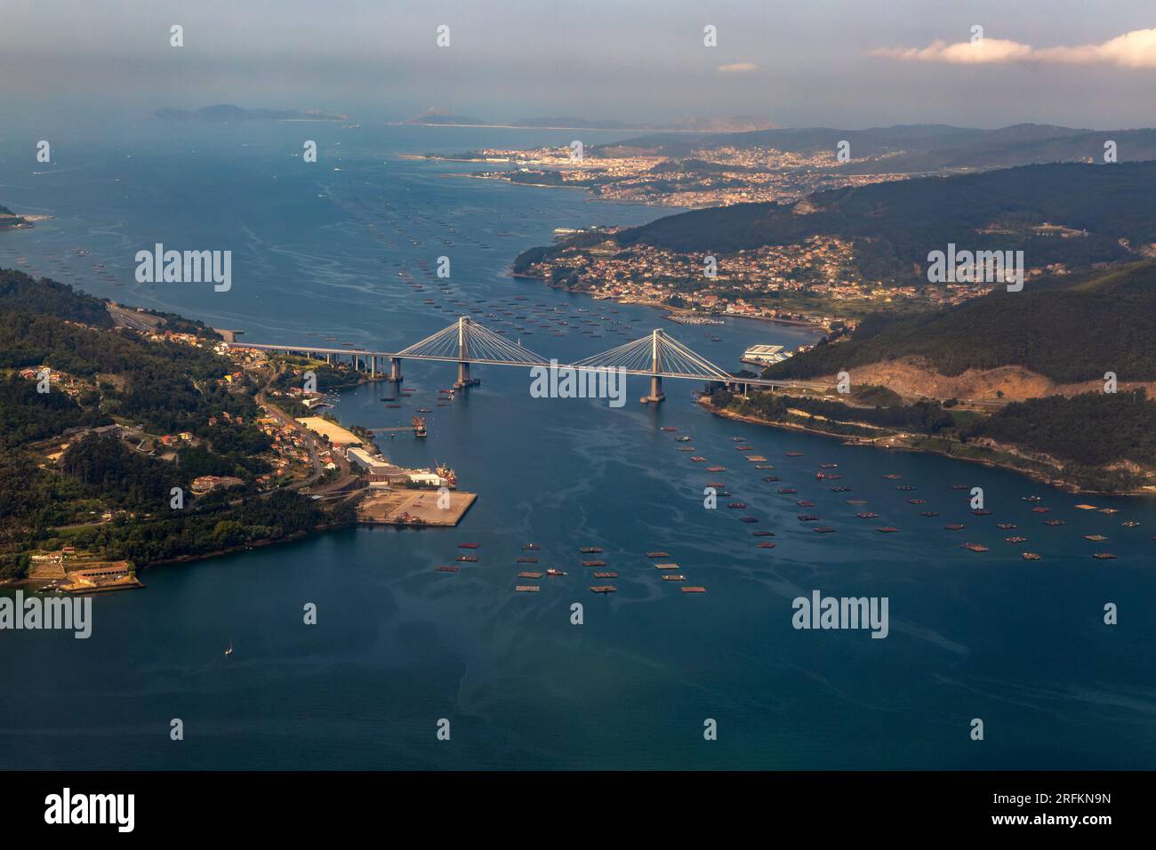 View through plane window, Ponte de Rande bridge, Ria de Vigo estuary ...