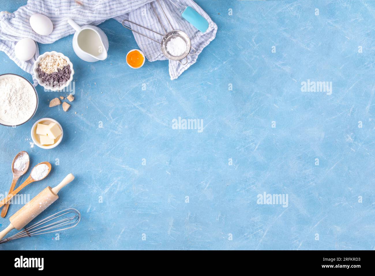 Baking ingredients background. Cooking ingredients (flour, eggs, milk ...