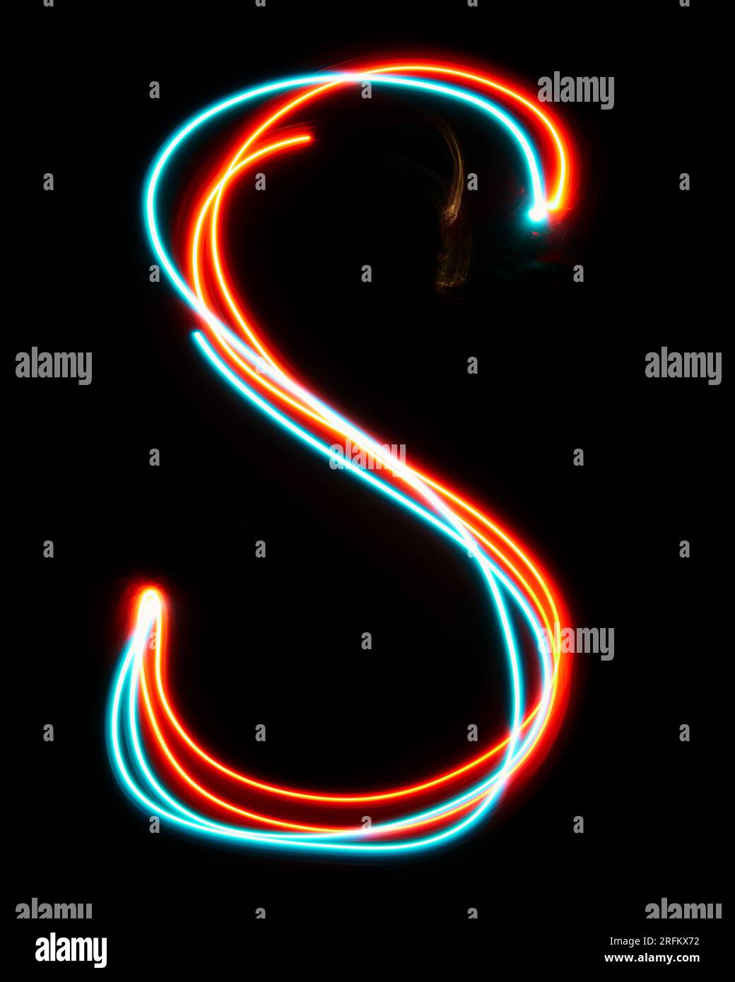 Letter S of the alphabet made from neon sign. The blue red light image ...