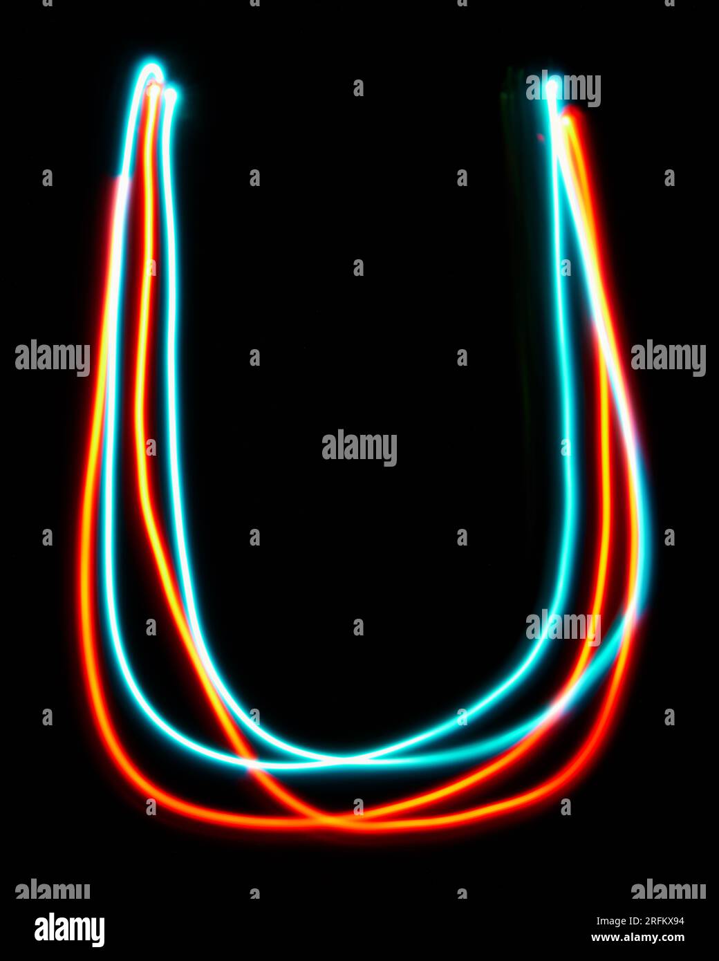 Letter U of the alphabet made from neon sign. The blue red light image ...