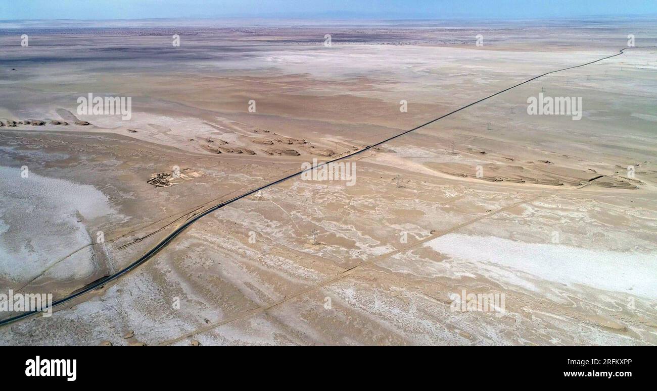 GOLMUD, CHINA - JULY 21, 2023 - The winding G315 road in the Qaidam ...