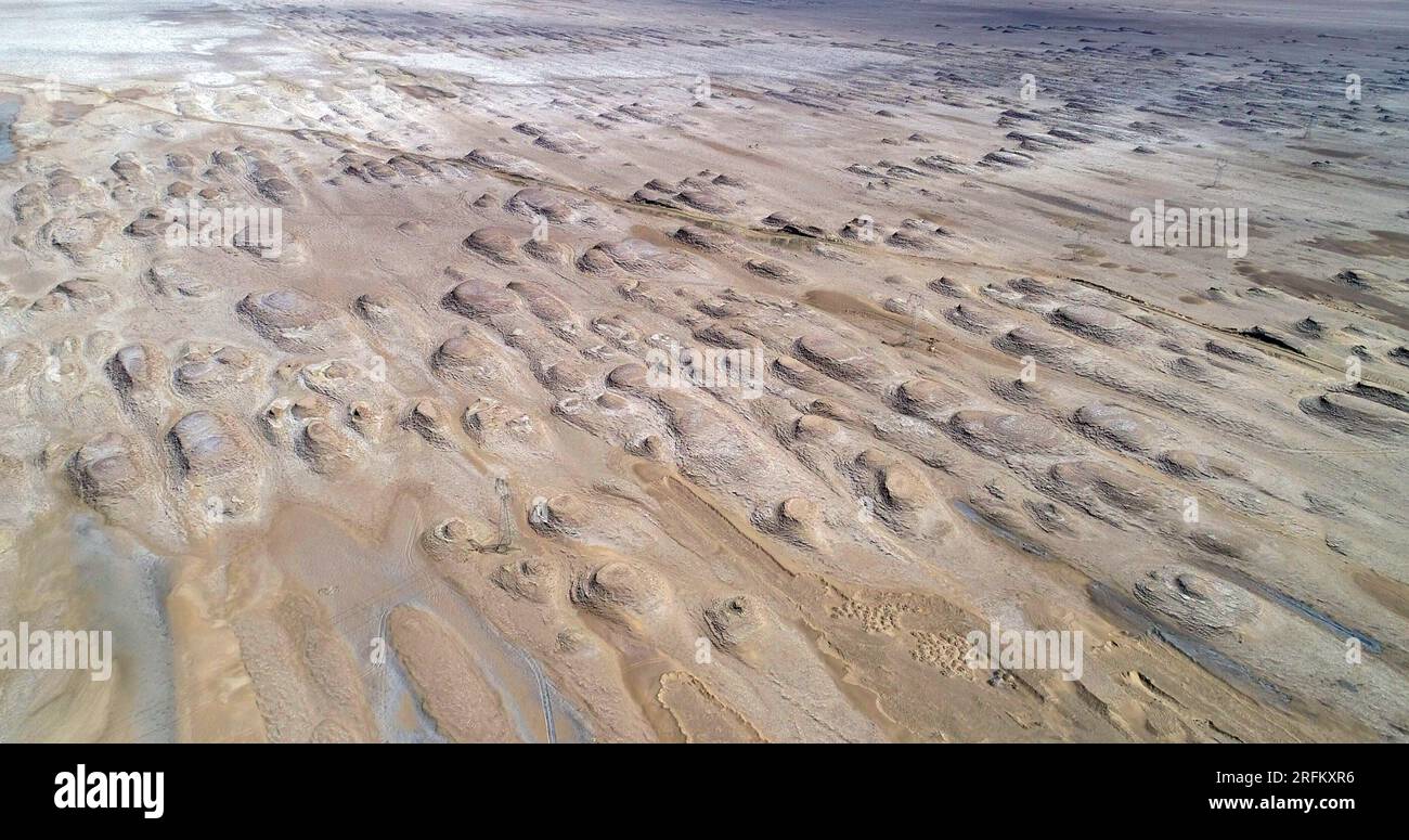 GOLMUD, CHINA - JULY 21, 2023 - The salt crust of the Qaidam Basin is ...