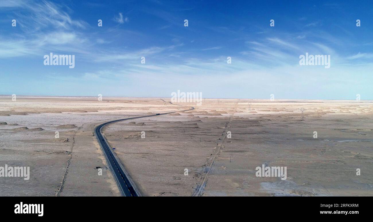 GOLMUD, CHINA - JULY 21, 2023 - The winding G315 road in the Qaidam ...
